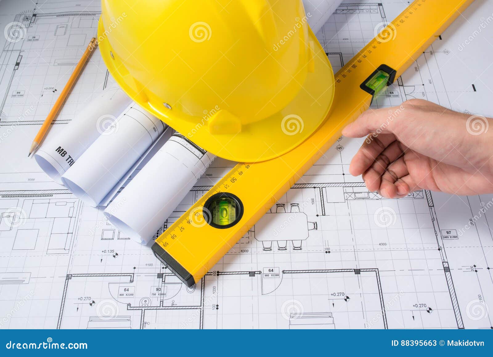 Construction Plans with Helmet and Drawing Tools on Blueprints Stock ...
