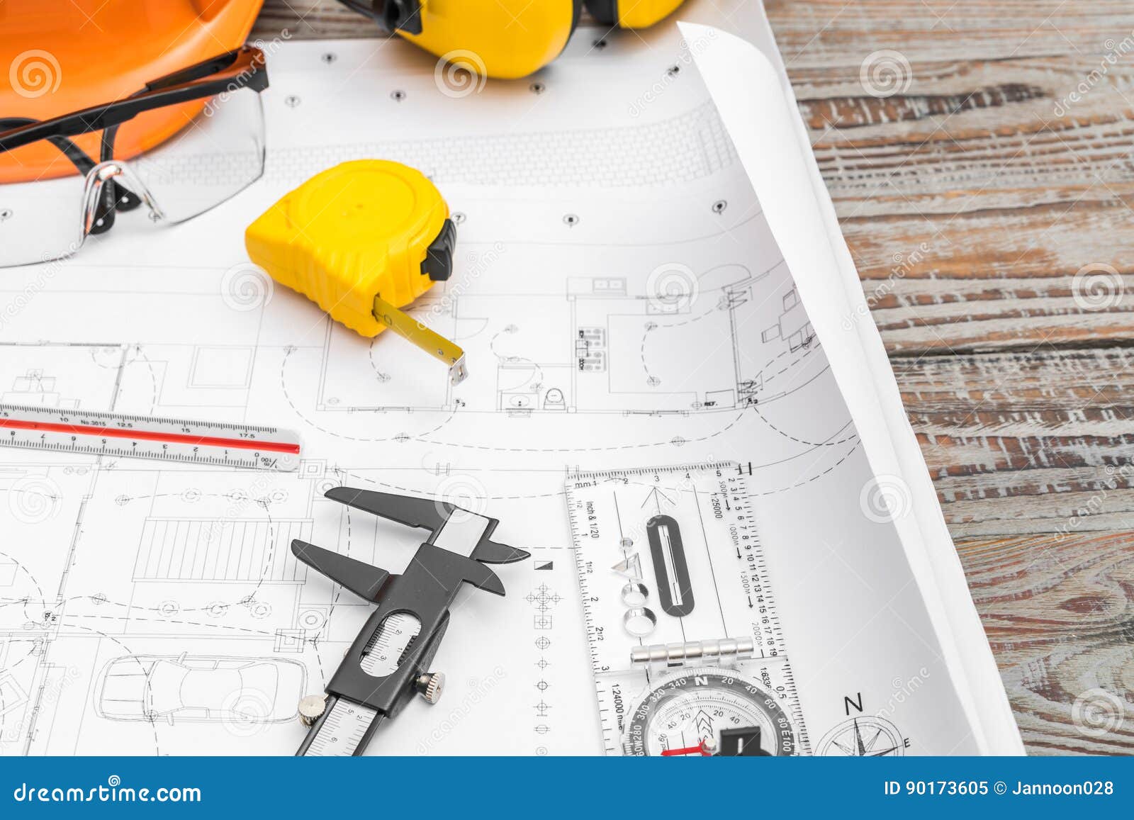 Construction Plans with Helmet and Drawing Tools on Blueprints . Stock ...