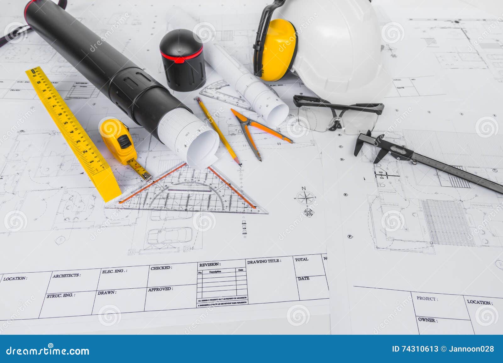 Construction Plans with White Helmet and Drawing Tools on Blueprints ...