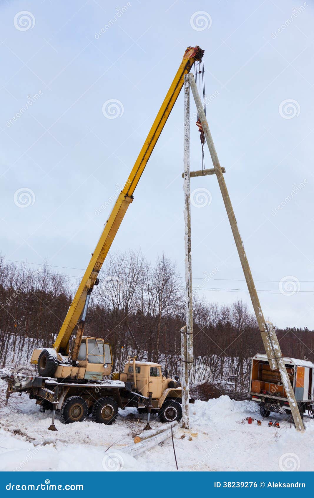Construction of Power Lines Using a Mobile Crane Stock Photo - Image of ...