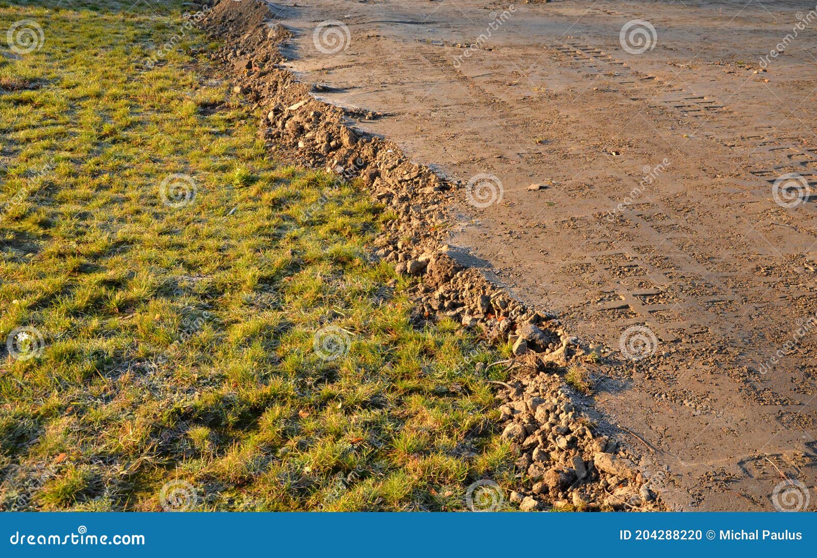 Construction Preparation by Leveling and Soil Compaction by Vibrating ...