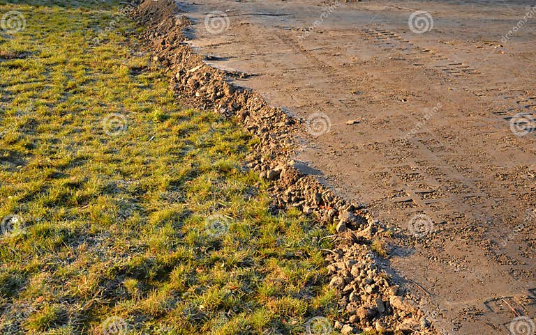 Construction Preparation by Leveling and Soil Compaction by Vibrating ...