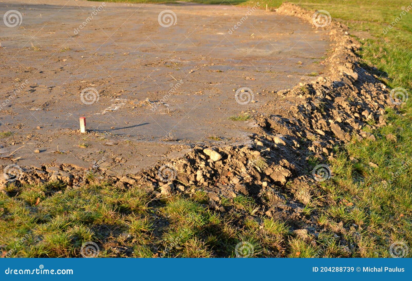 Construction Preparation by Leveling and Soil Compaction by Vibrating ...