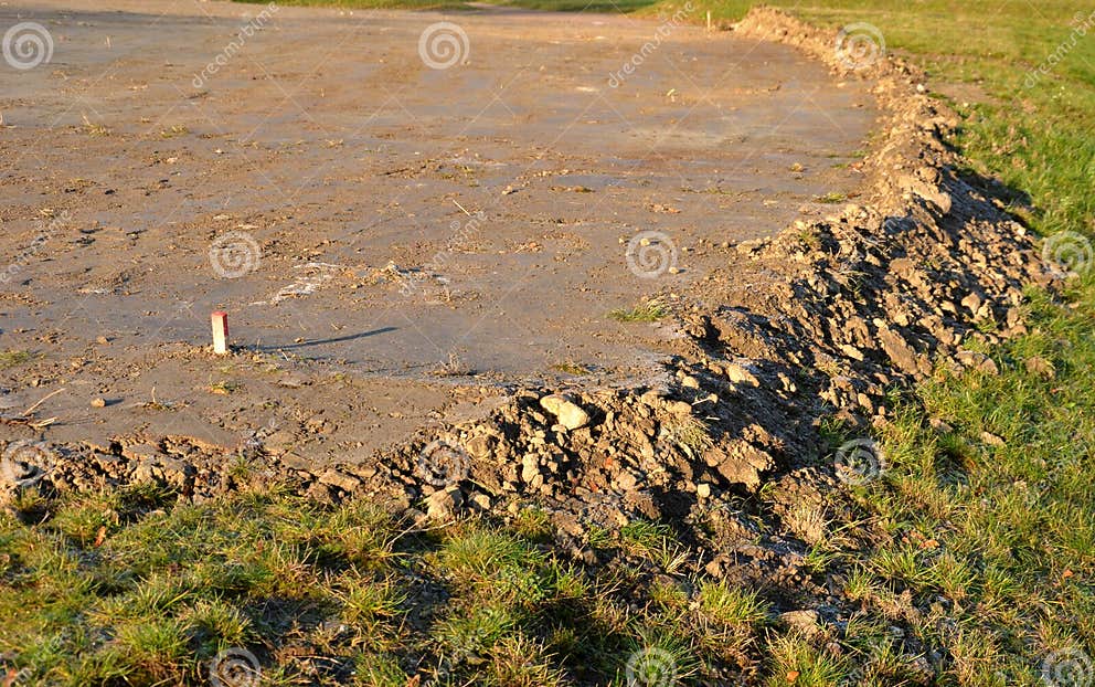 Construction Preparation by Leveling and Soil Compaction by Vibrating ...