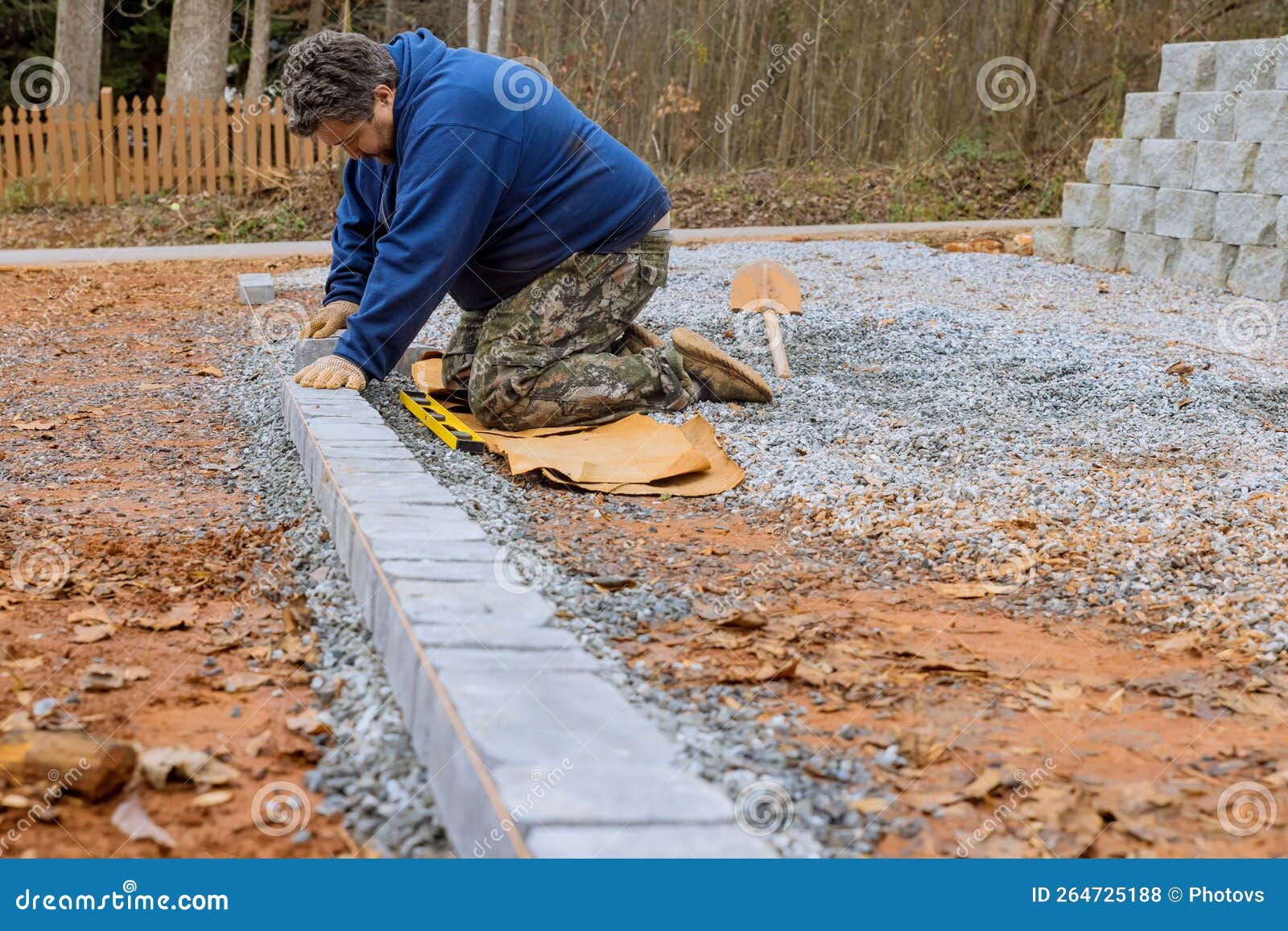 During the Construction Process, a Construction Worker Arranges Precast ...