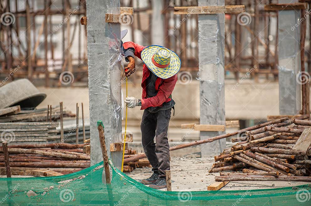 Construction in Progress. Men at Work. Stock Photo - Image of machinery ...