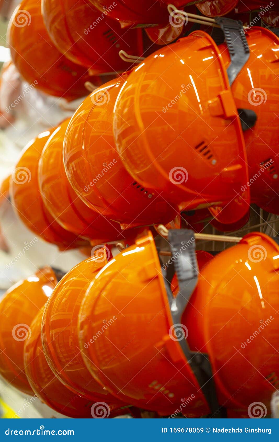 Construction Protective Red Helmets on the Shelves in the Hardware ...