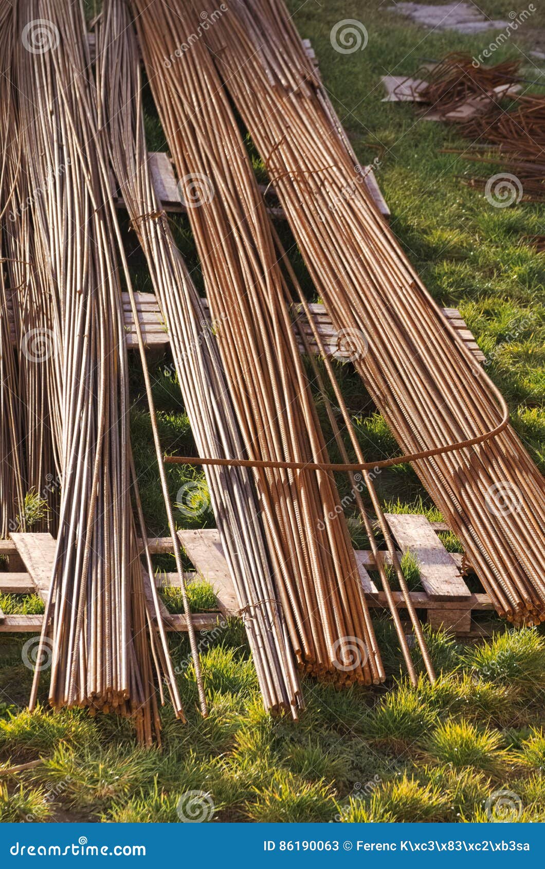 Construction Rods on the Grass Stock Image - Image of metallic ...