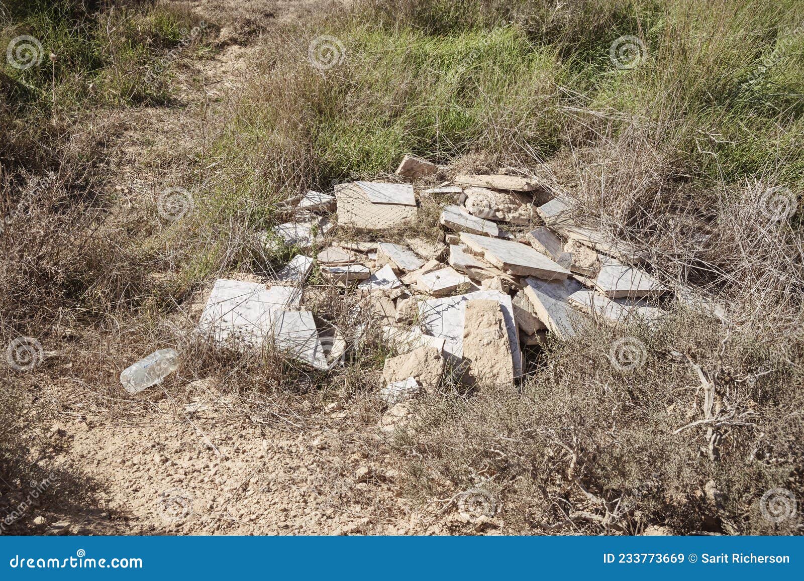 Construction Rubble Polluting a Protected Stream Bed in a Nature ...