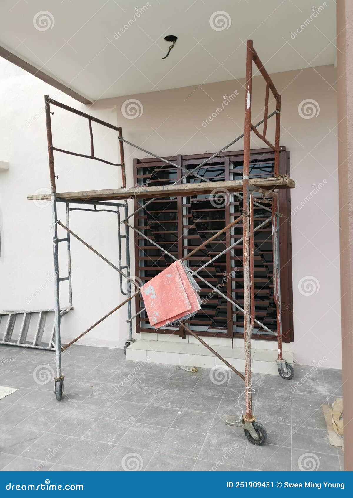 CONSTRUCTION SCAFFOLD Ladder Stacked Outside the Concrete Home Stock ...