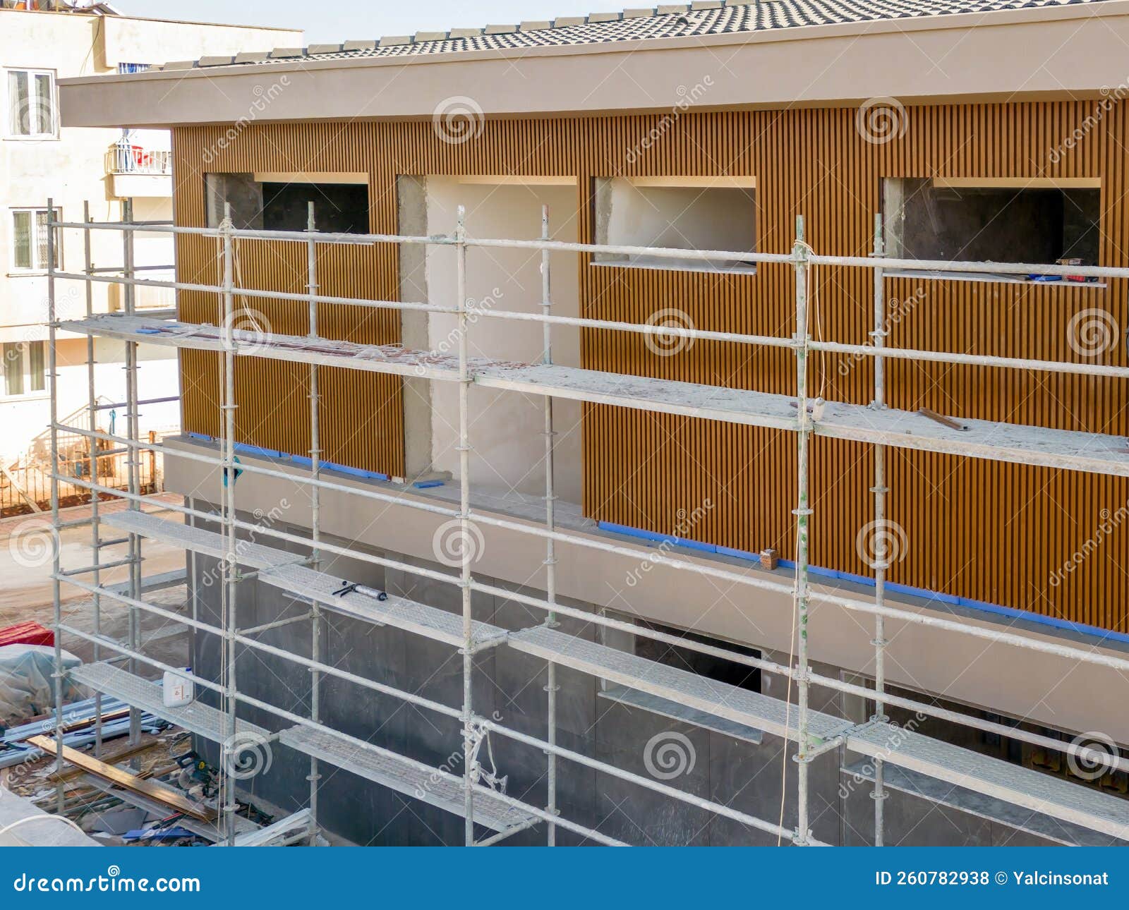 Construction Scaffolding Built on a New Apartment Building. New ...