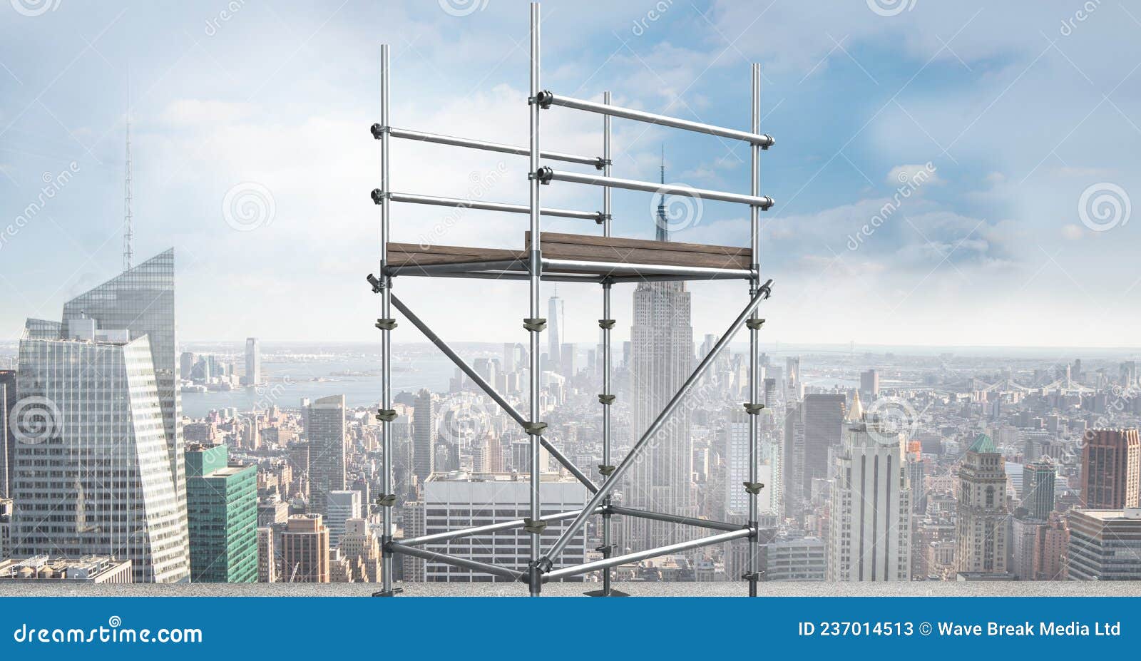 Construction Scaffolding Over a Cityscape Against Clouds in the Blue ...