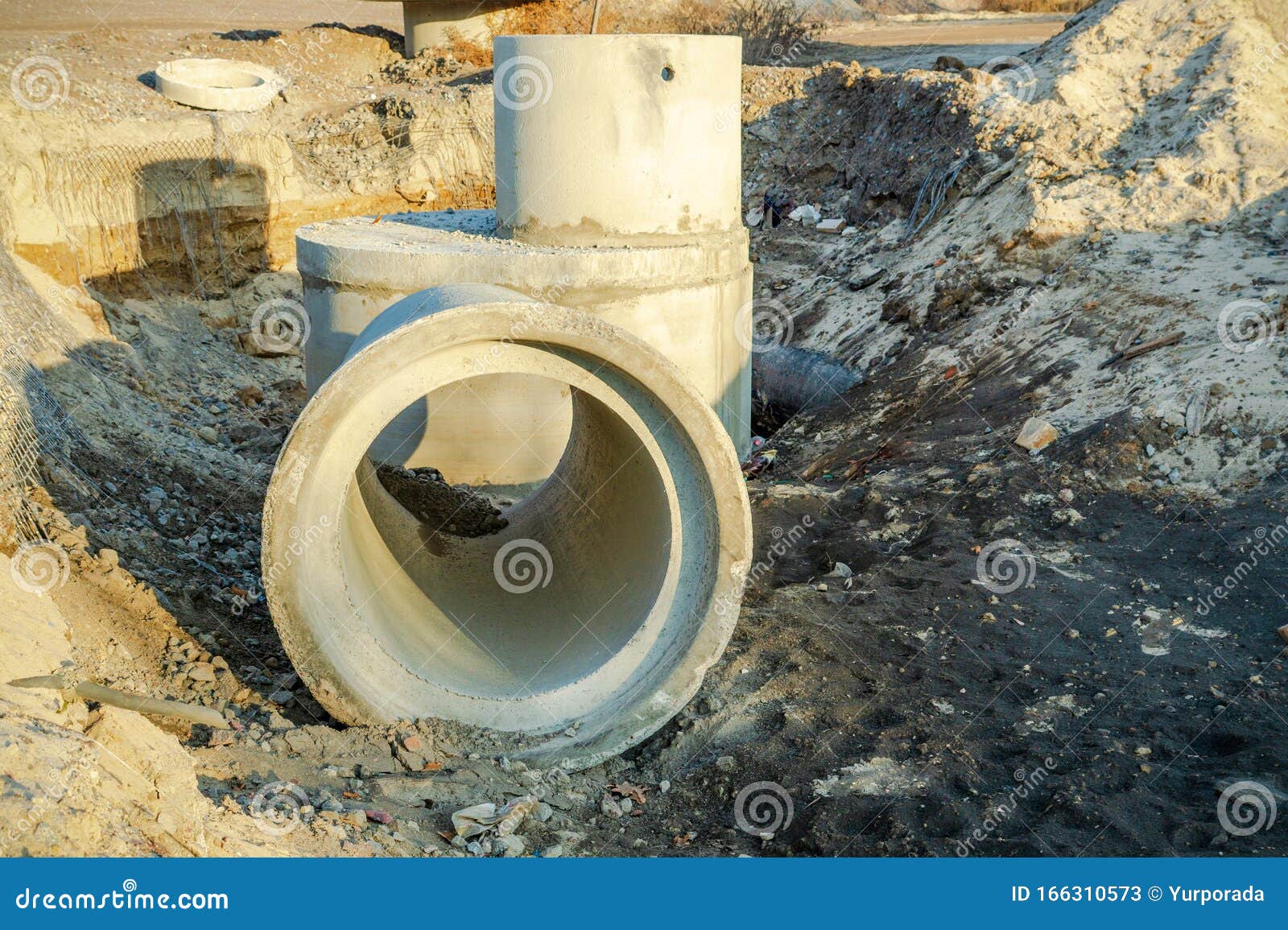 Construction of Sewage with Concrete Pipes in the Pit Stock Image ...