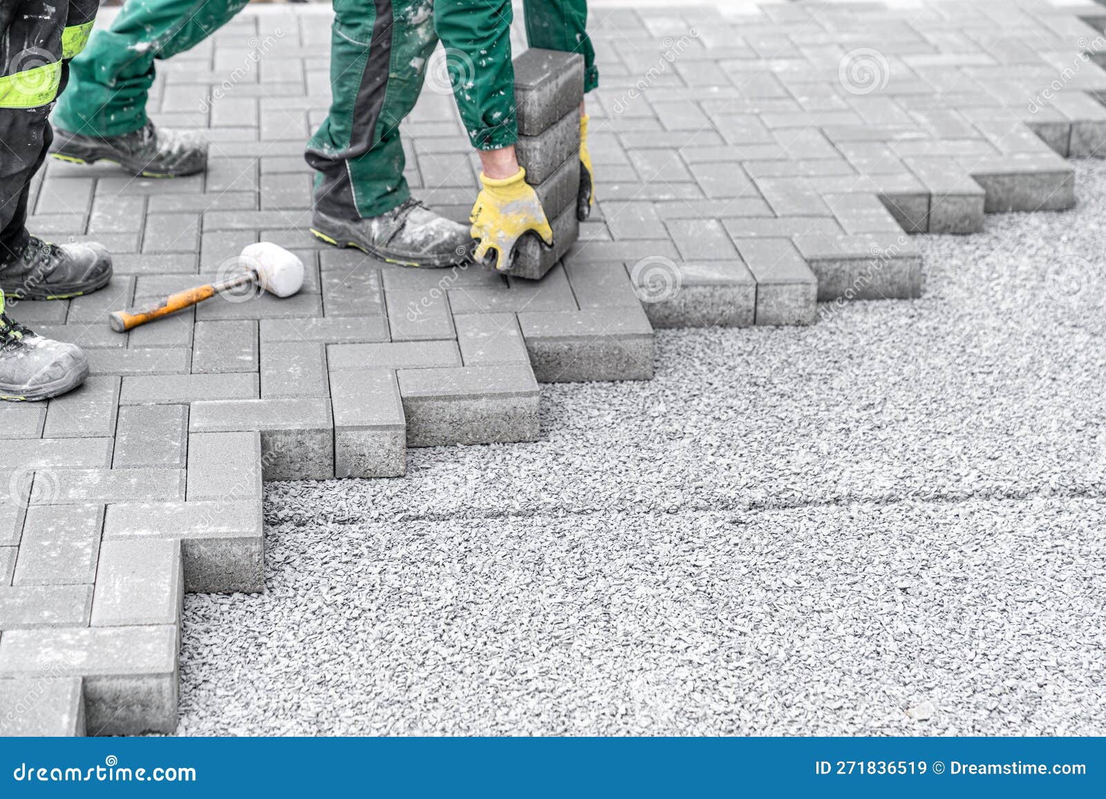 Construction of a Sidewalk from Concrete Blocks Stock Image - Image of ...