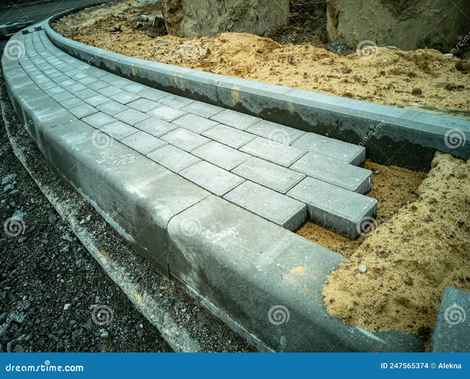Construction Of A Sidewalk From Paving Slabs And Concrete Curbs Royalty ...
