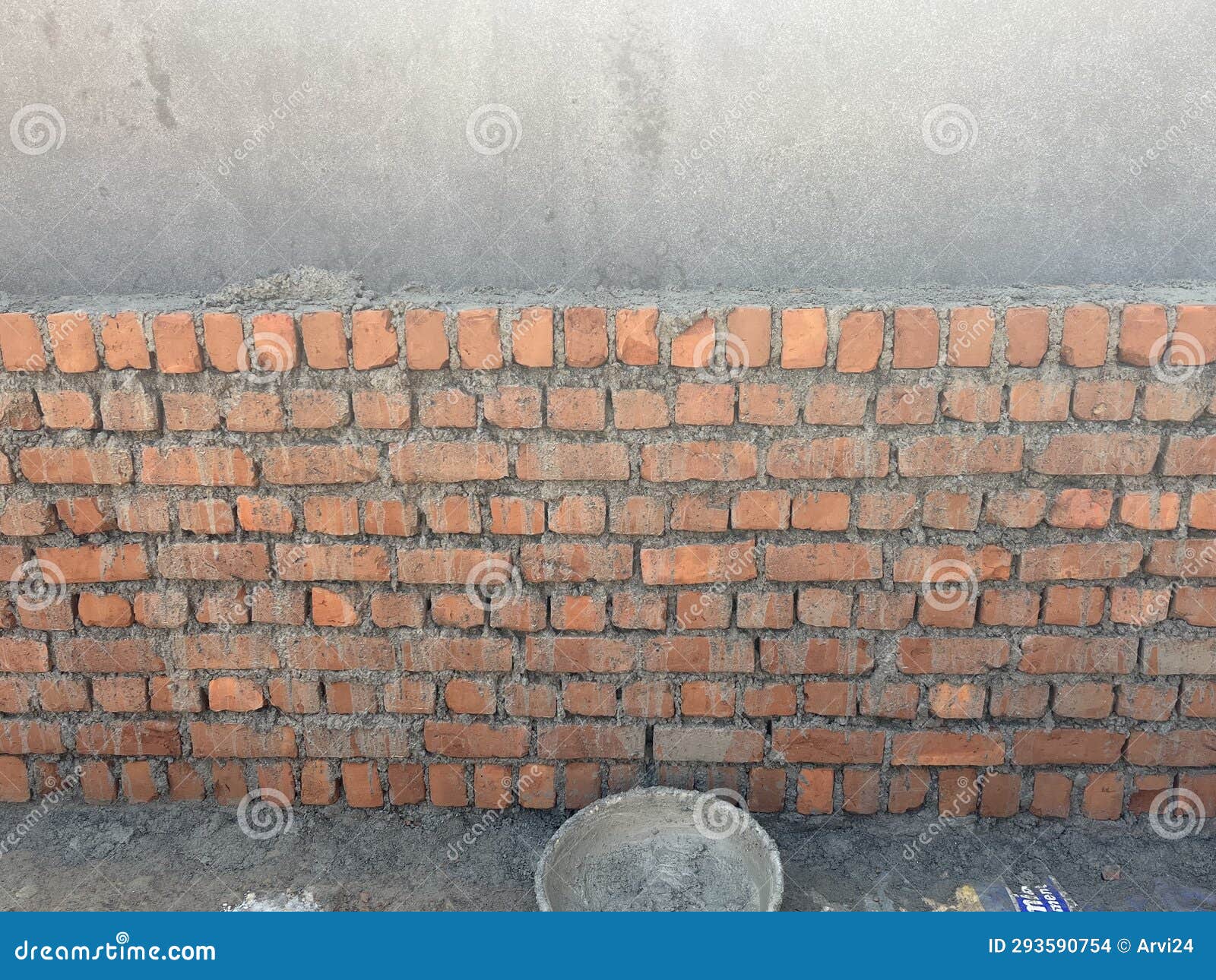 Construction of a Single Line Red Bricks by Applying Cement in between ...