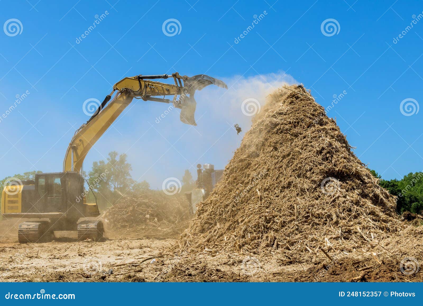 Construction Site Area in Wood Chipper Machine with Mulch an Work Stock ...