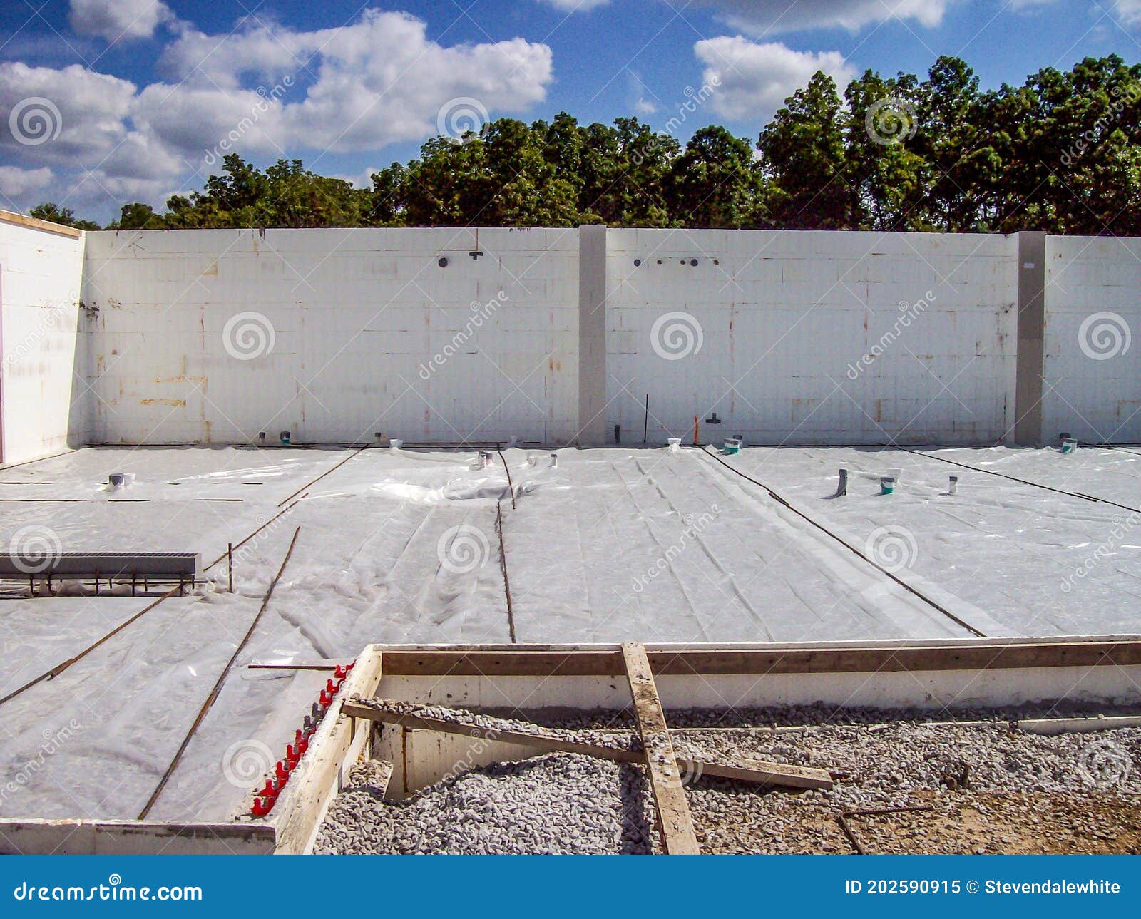 Construction Site for a Berm Home with Forms in Place for Pouring the ...