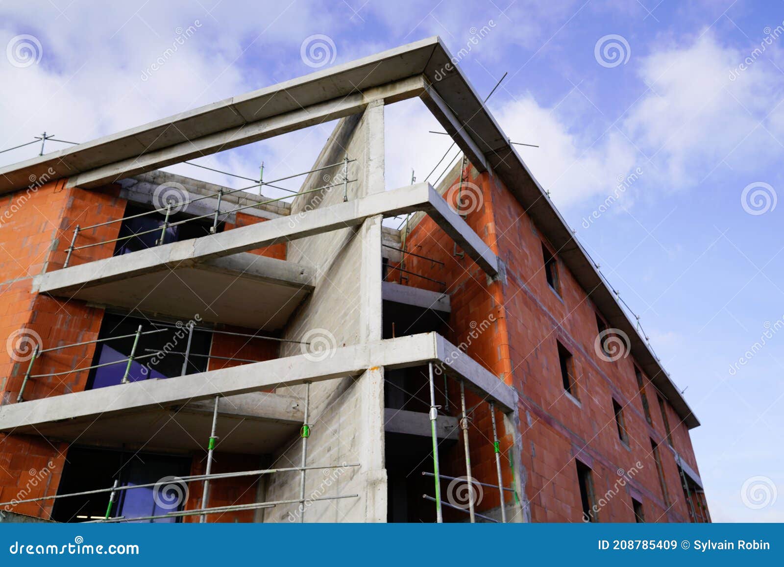 Construction Site of Brick and Cement Building with Large Balcony ...