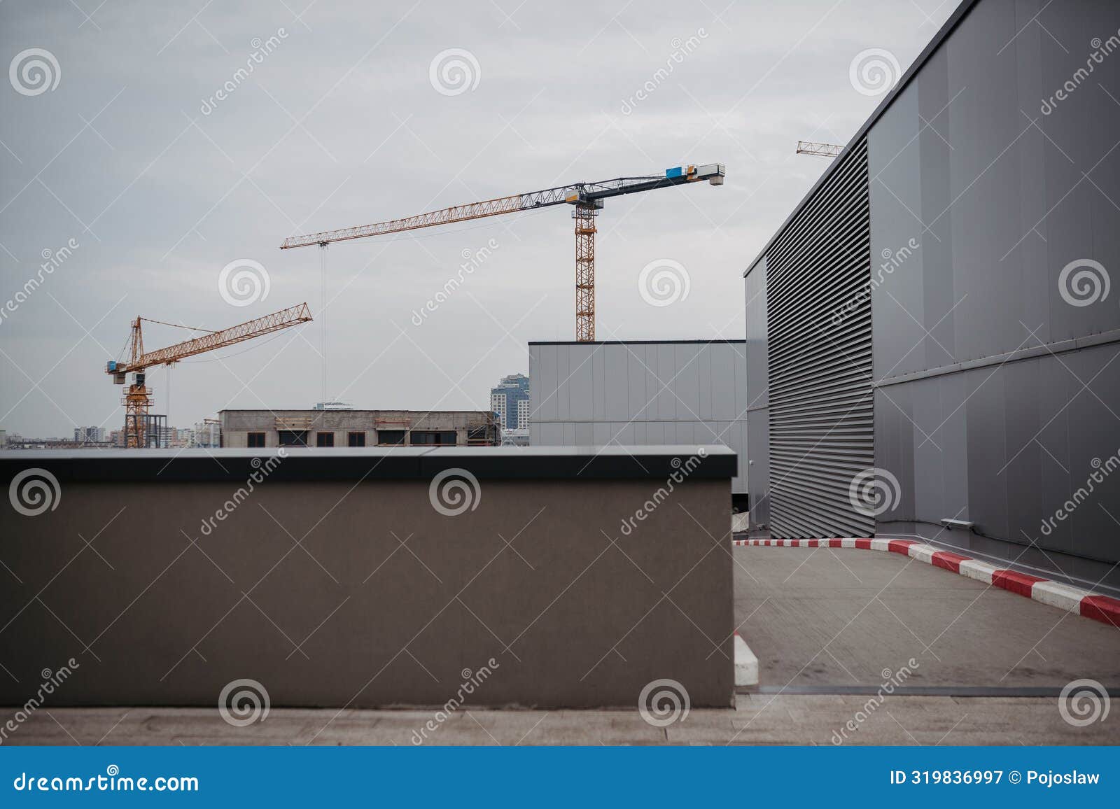 Construction Site with Buildings Under Construction with Two Cranes ...