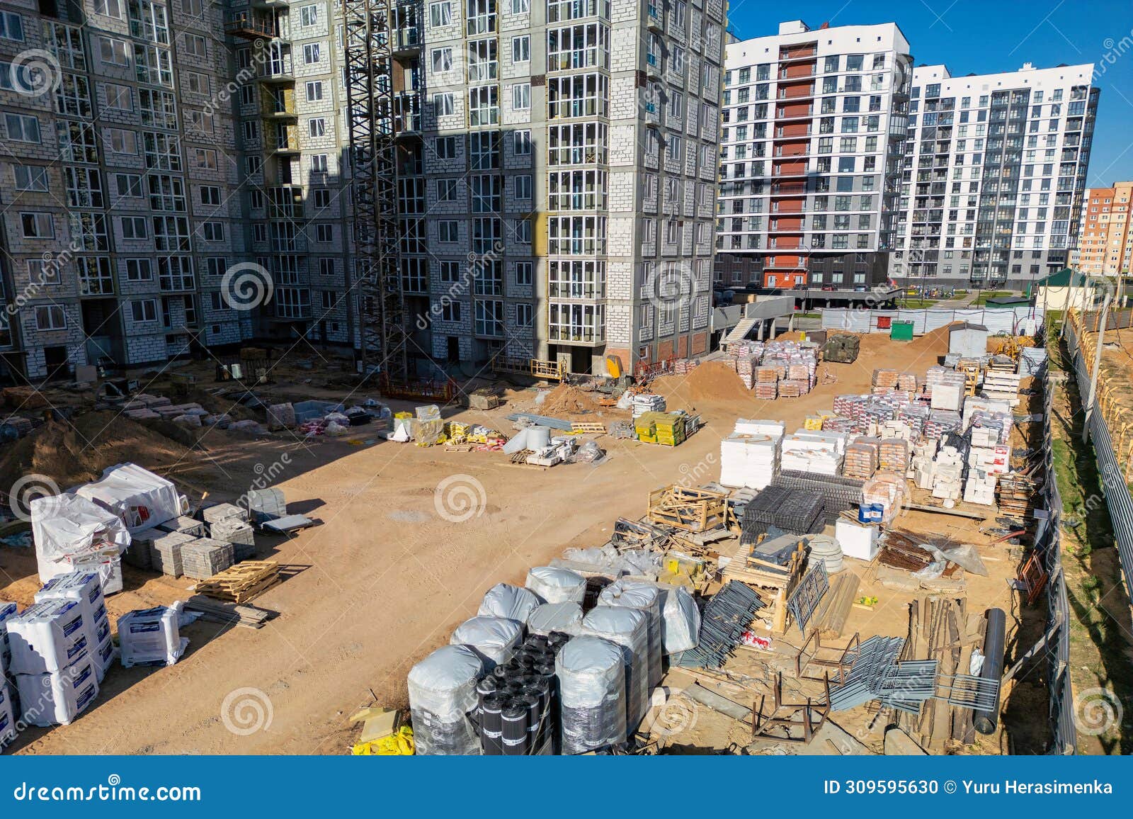 A Construction Site Bustling with Activity in the Heart of a City, with ...