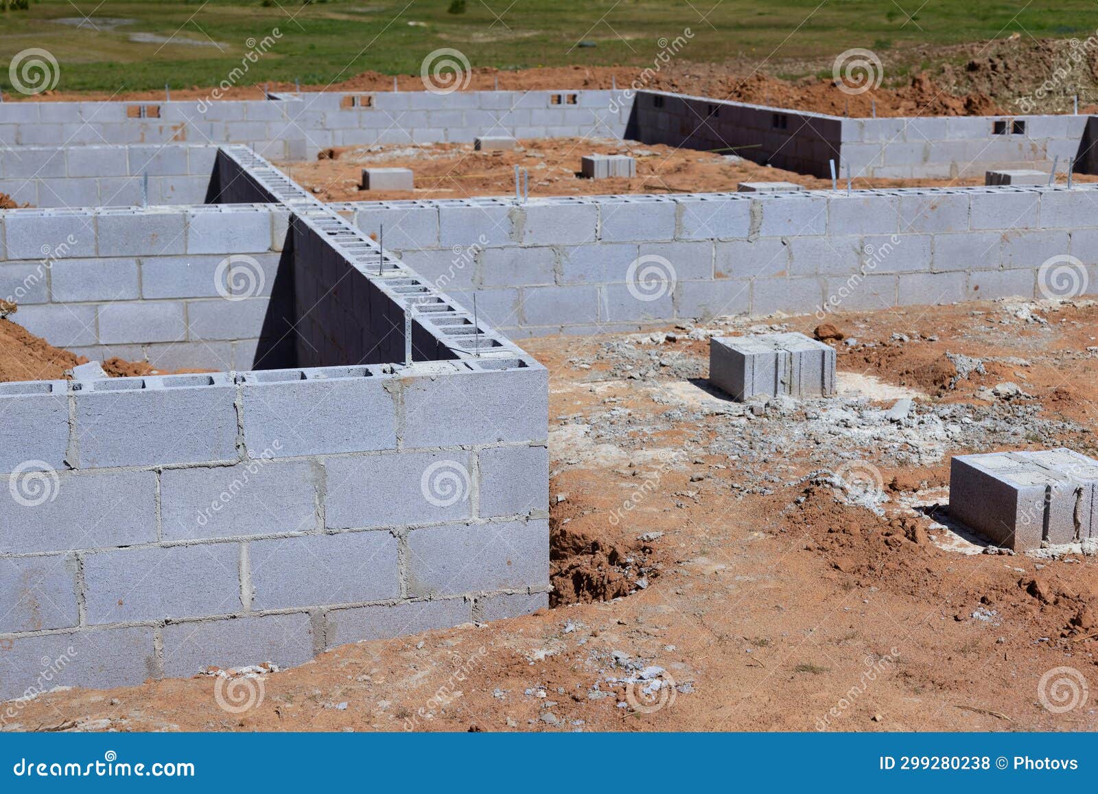 At a Construction Site, Cement Blocks Support Foundation for Wall of ...