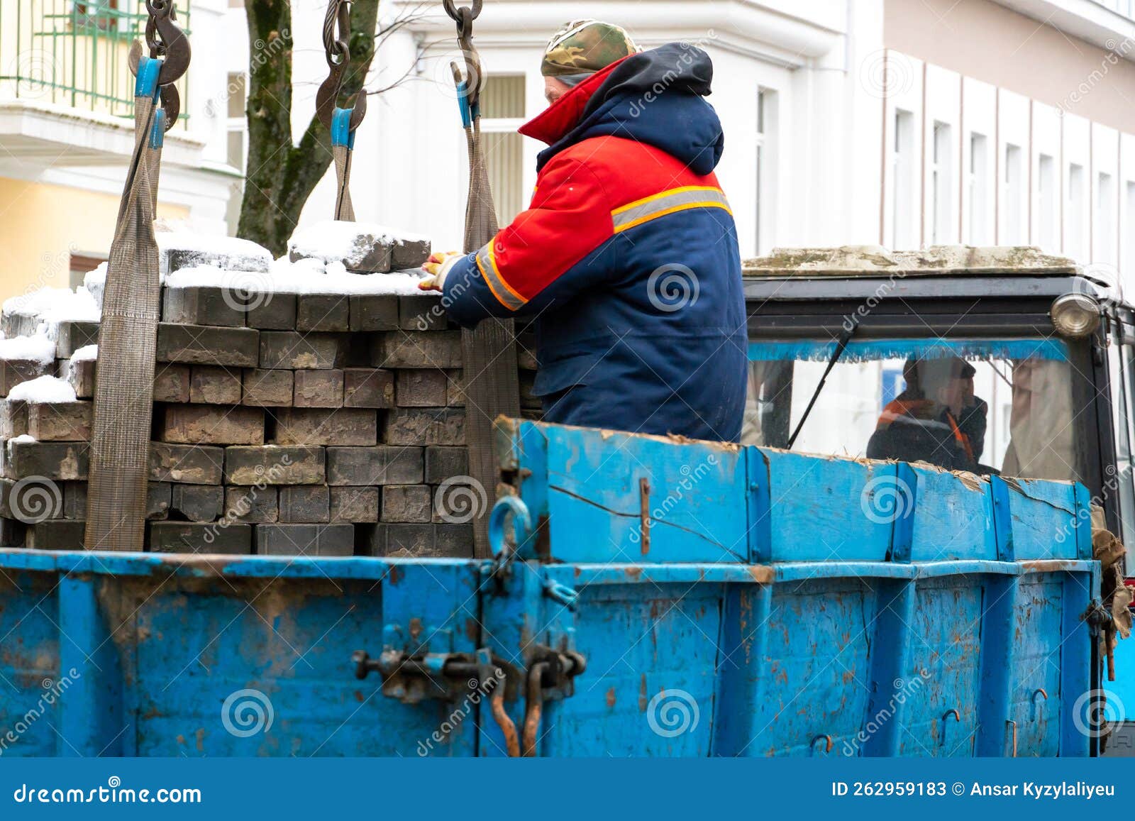 Construction Site in the City in Winter. Workers Work at the Facility ...