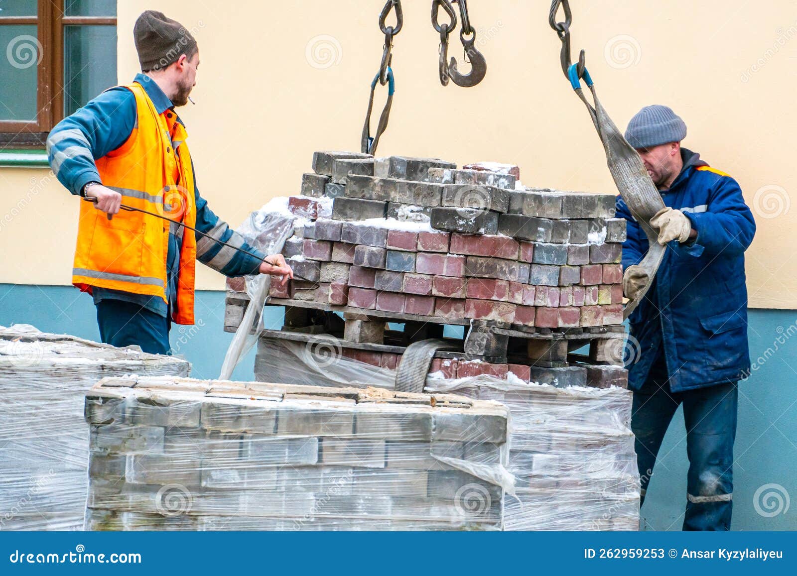 Construction Site in the City in Winter. Workers Work at the Facility ...