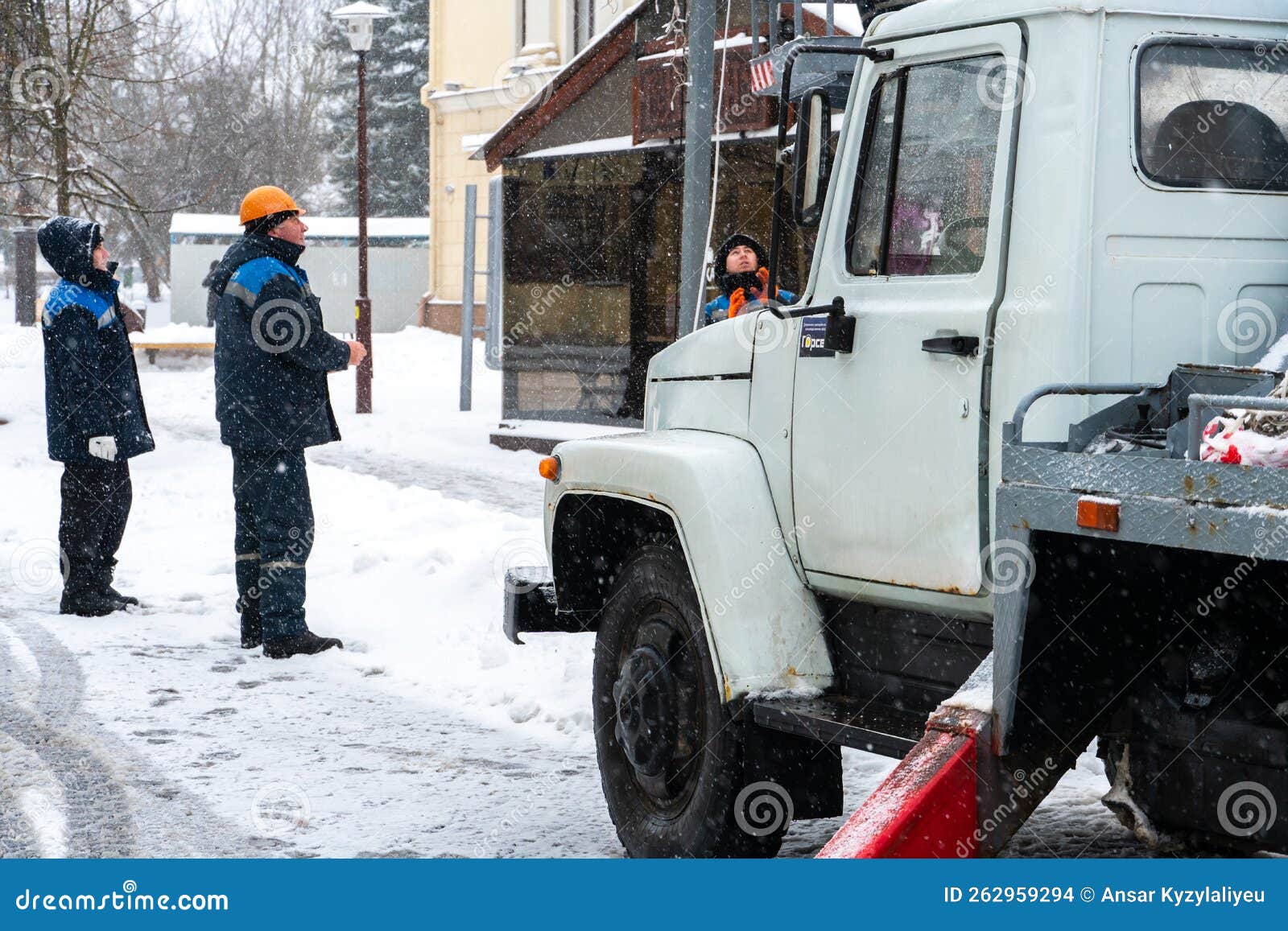 Construction Site in the City in Winter. Workers Work at the Facility ...