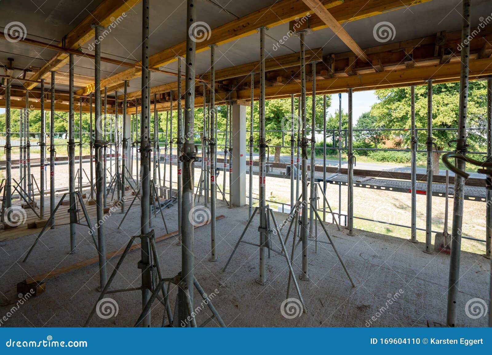 A Construction Site, Concrete Columns for a Factory Building are Placed ...