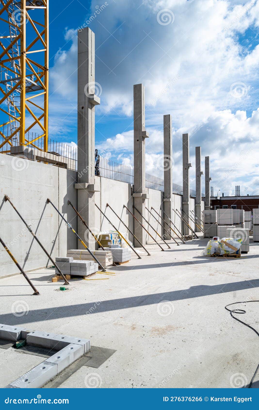On a Construction Site Concrete Walls are Supported with Turnstiles ...