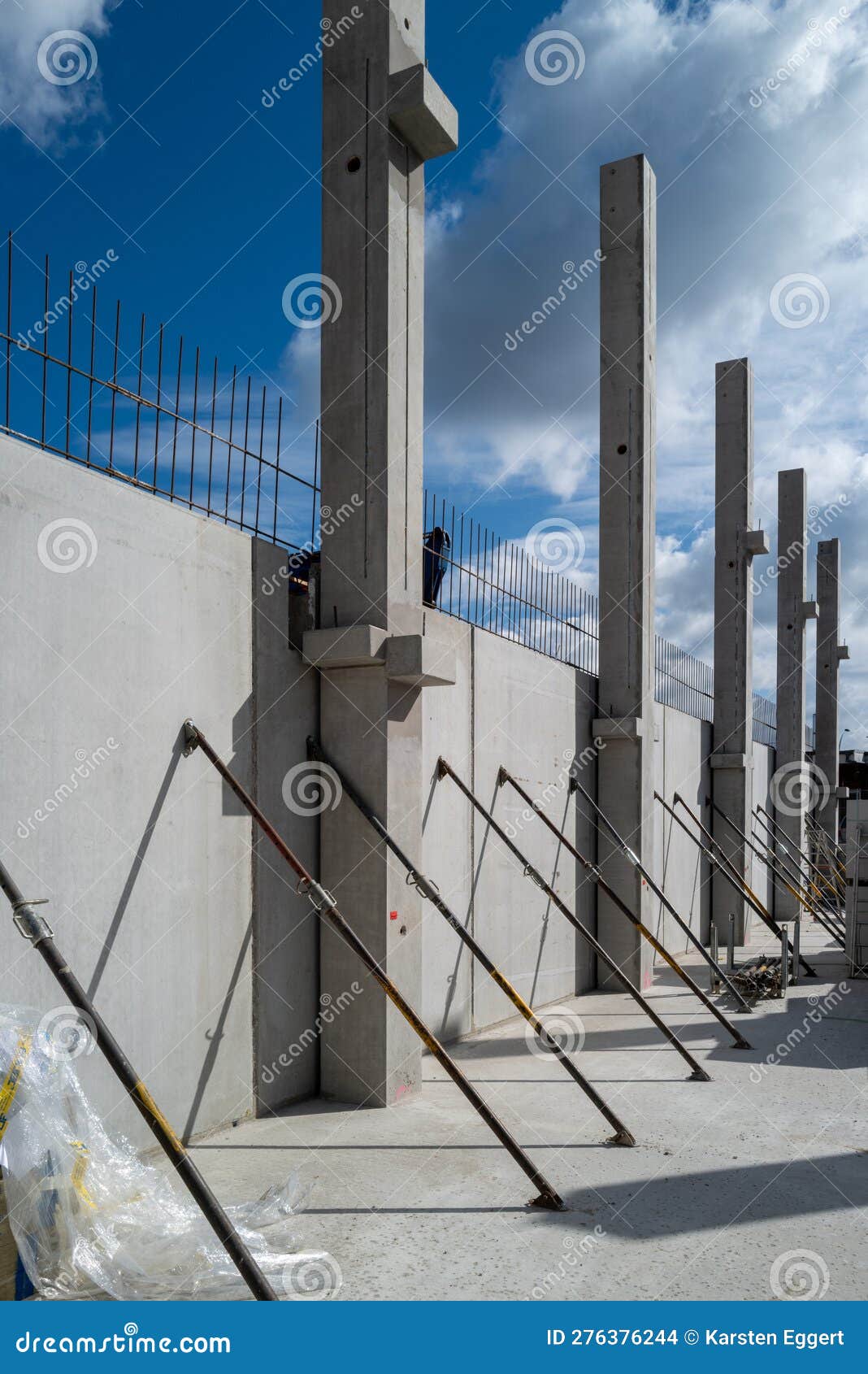 On a Construction Site Concrete Walls are Supported with Turnstiles ...