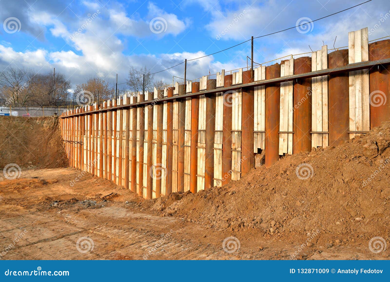 Construction Site; Construction Pit with Metal Pipes Supporting Stock ...