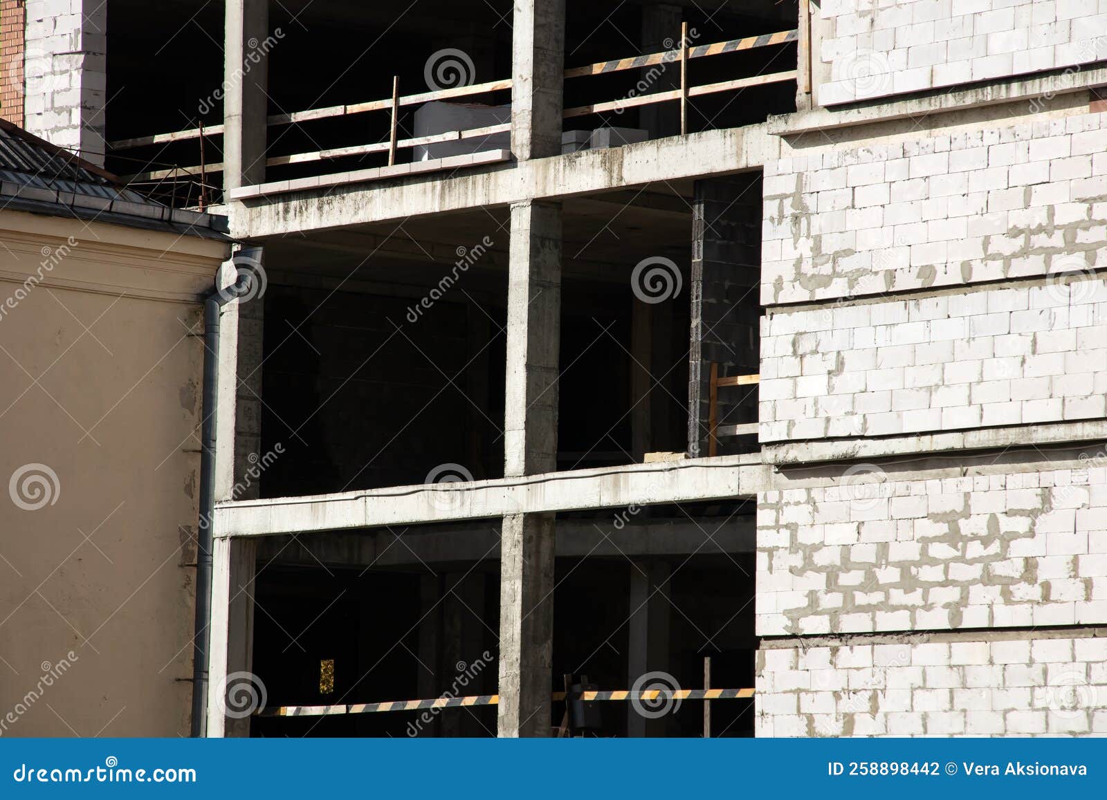 Construction Site and Construction of Tall Building from Blocks Stock ...