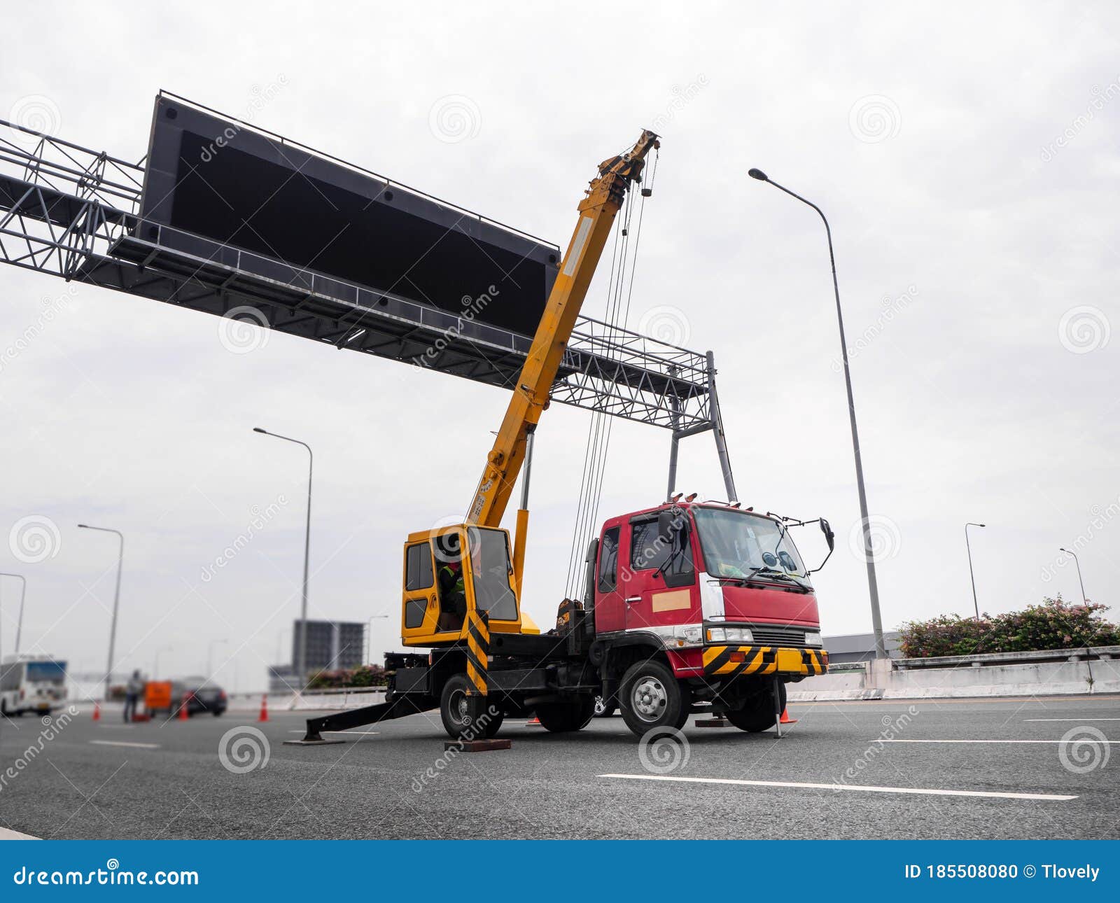Construction Site Crane is Lifting a Led Signboard for Advertisement ...
