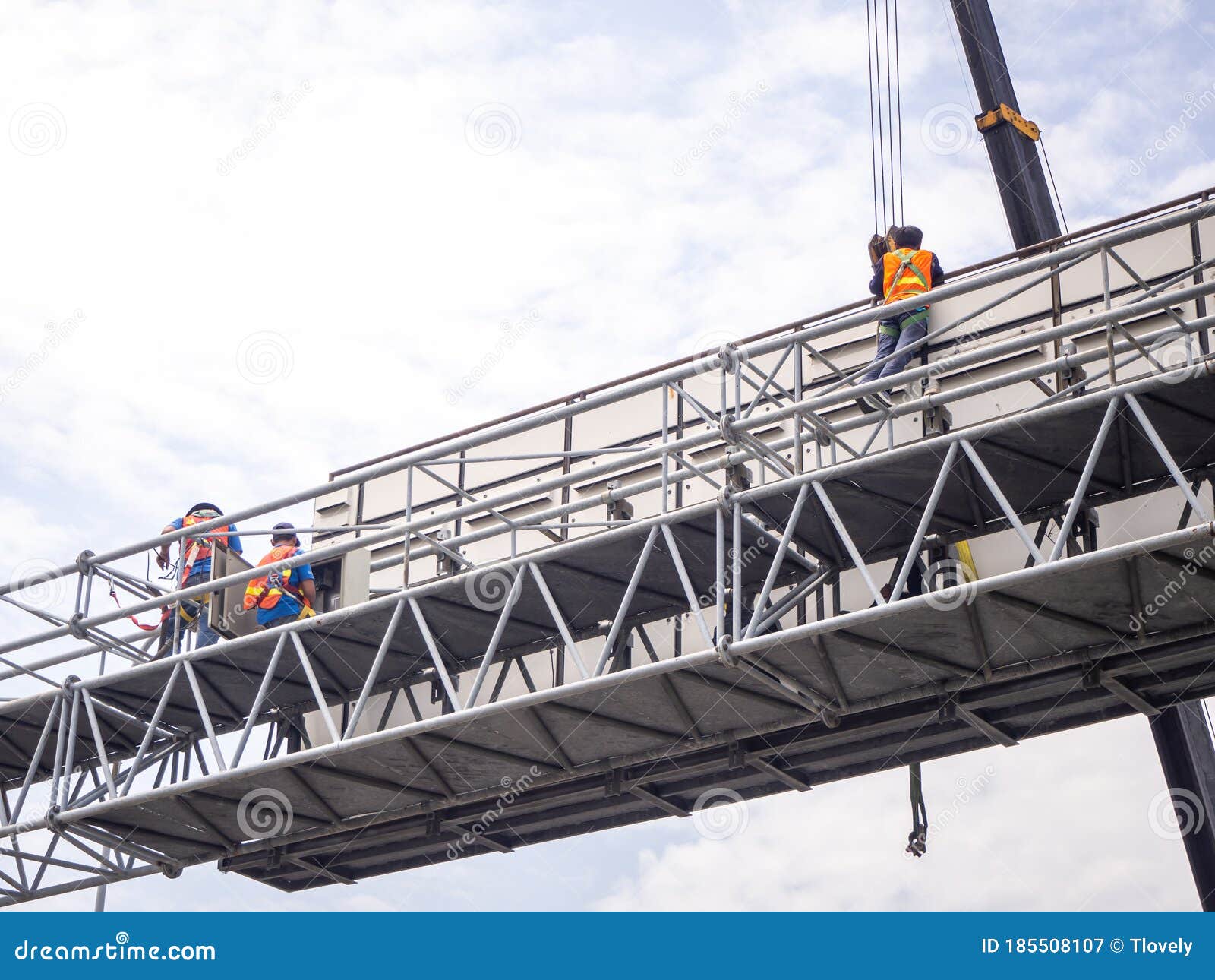 Construction Site Crane is Lifting a Led Signboard for Advertisement ...