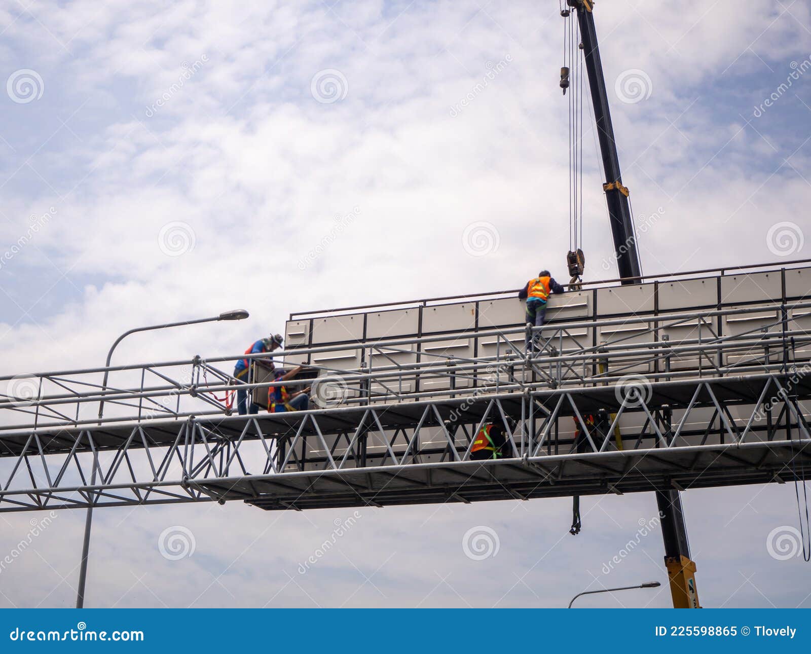 Construction Site Crane is Lifting a Led Signboard for Advertisement ...