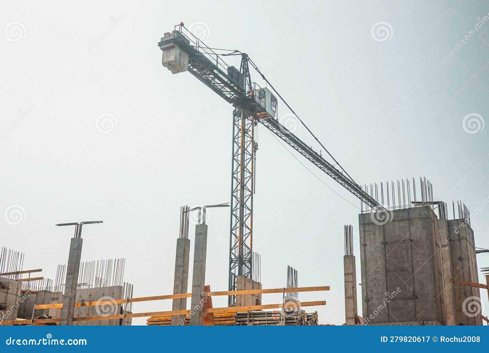 Construction Site, Crane Rising Above the Building Under Construction ...