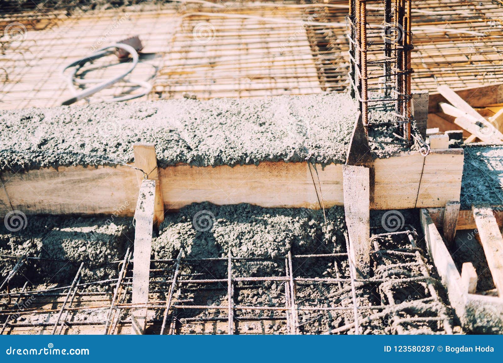 Construction Site Details - Concrete Pouring in Wooden Framed Beams ...