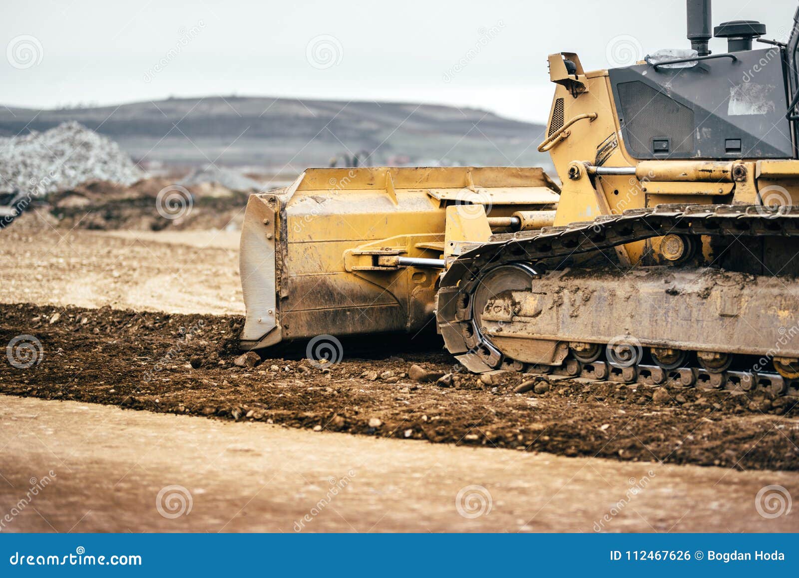 Highway Construction Site Development with Bulldozer Moving Earth, Soil ...