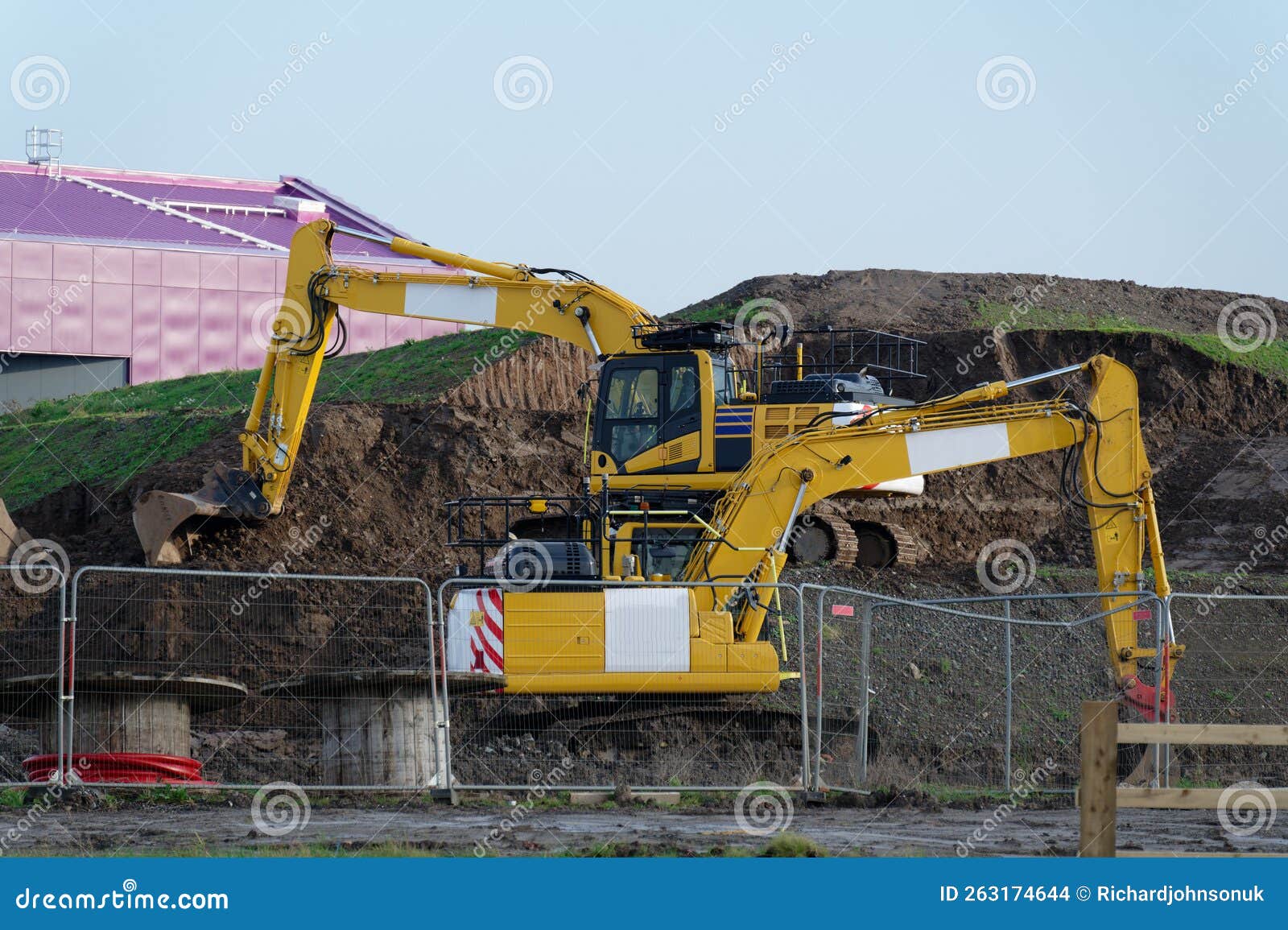 Construction Site Digger Yellow during Excavation on Building Site ...
