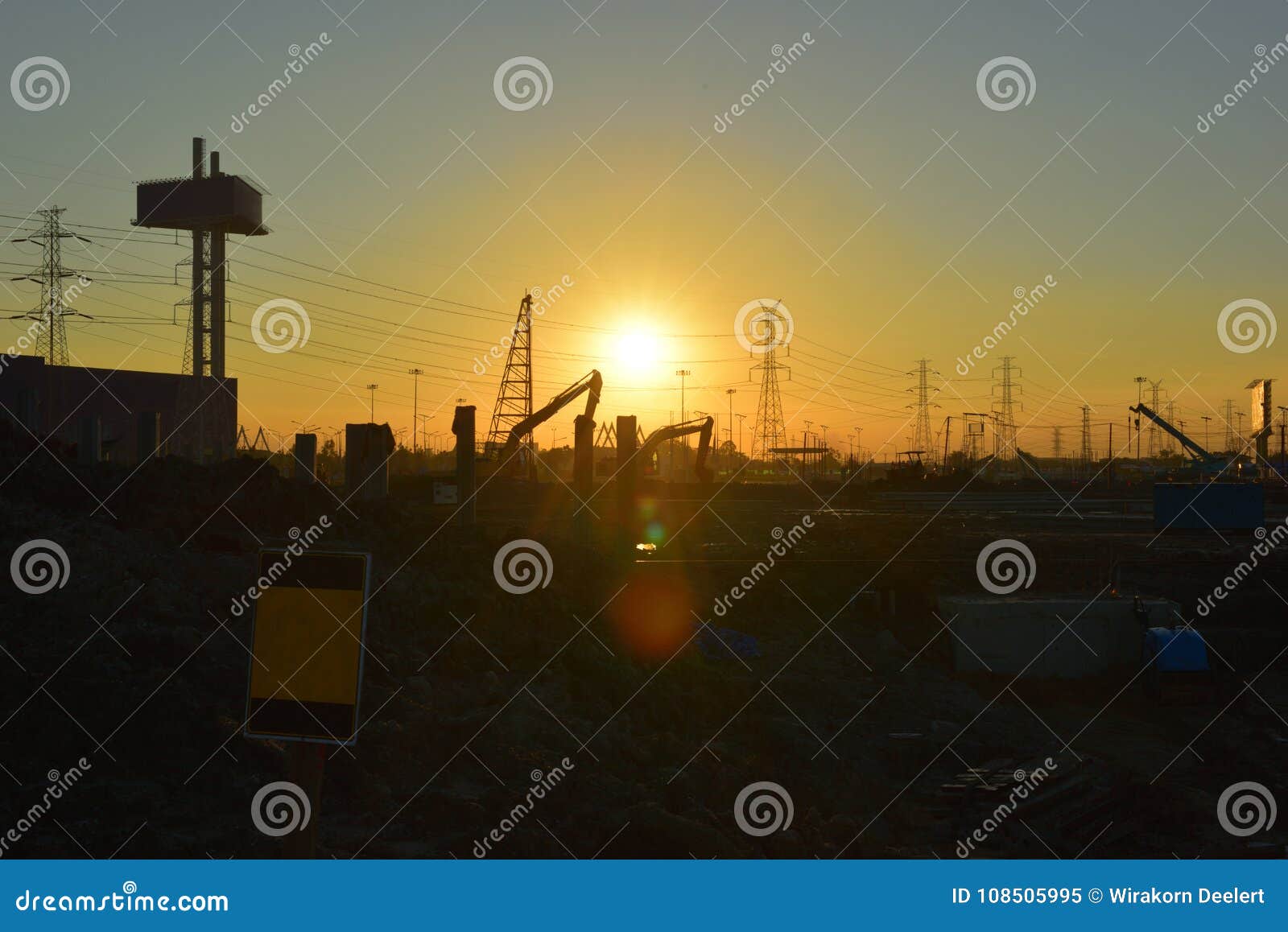 Construction Site and Electrical Pole with Sunrise Sky Stock Image ...