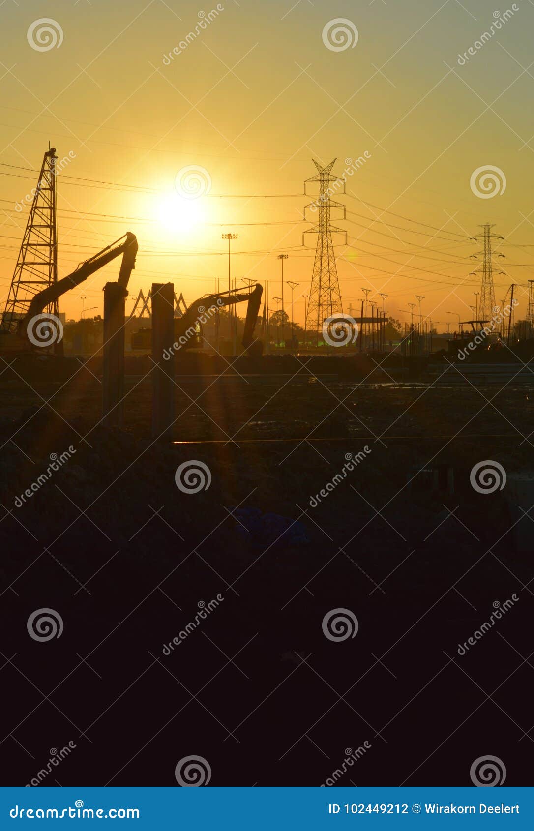 Construction Site and Electrical Pole with Sunrise Sky Stock Photo ...