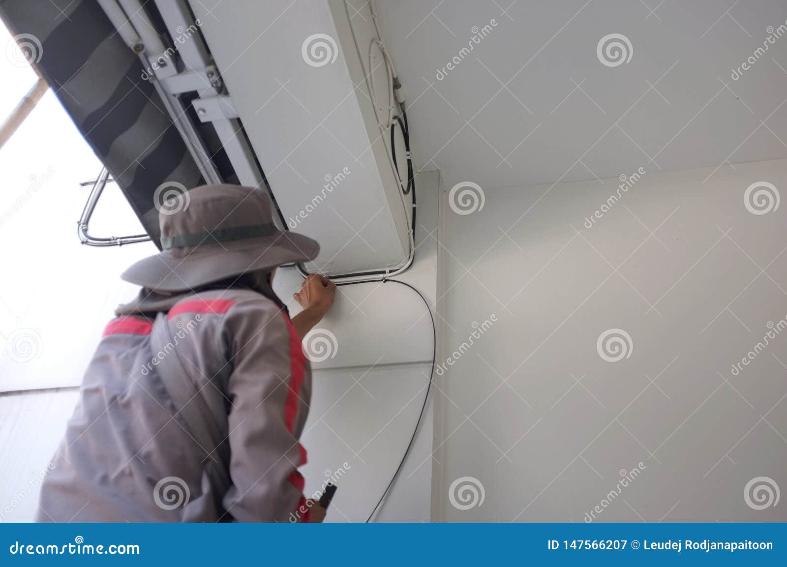 Construction Site Electrician. Worker with Electric Cables Stock Image ...