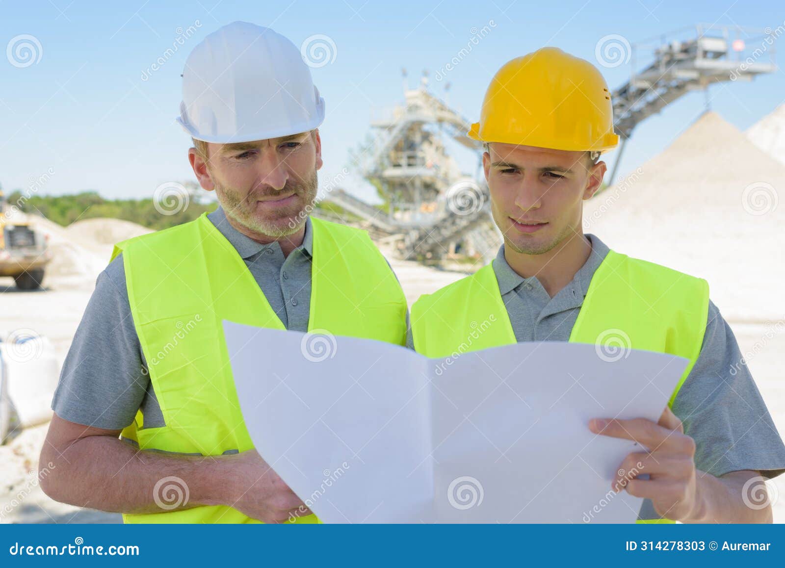Construction Site Engineers Looking at Plan Stock Image - Image of ...