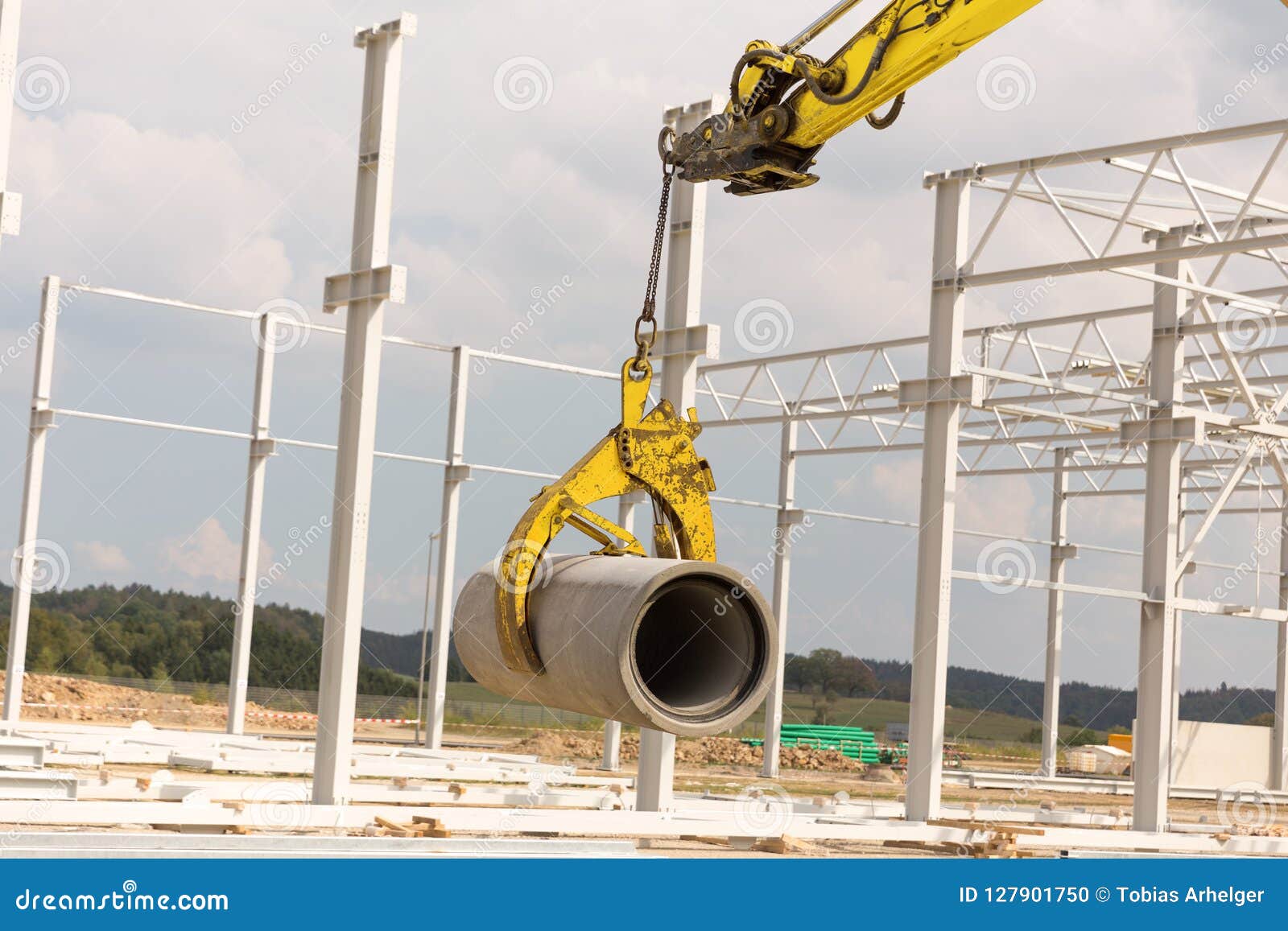 Construction Site Excavator with a Concrete Pipe Stock Photo - Image of ...