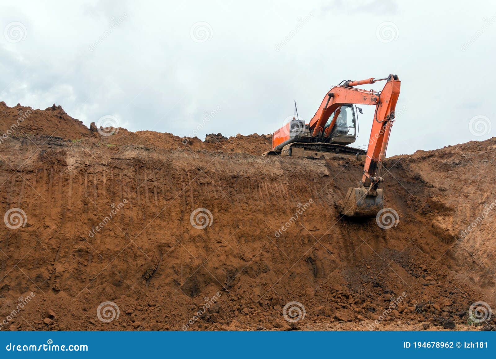 Excavator Digs The Ground. Part Of Construction Earthmoving Equipment ...