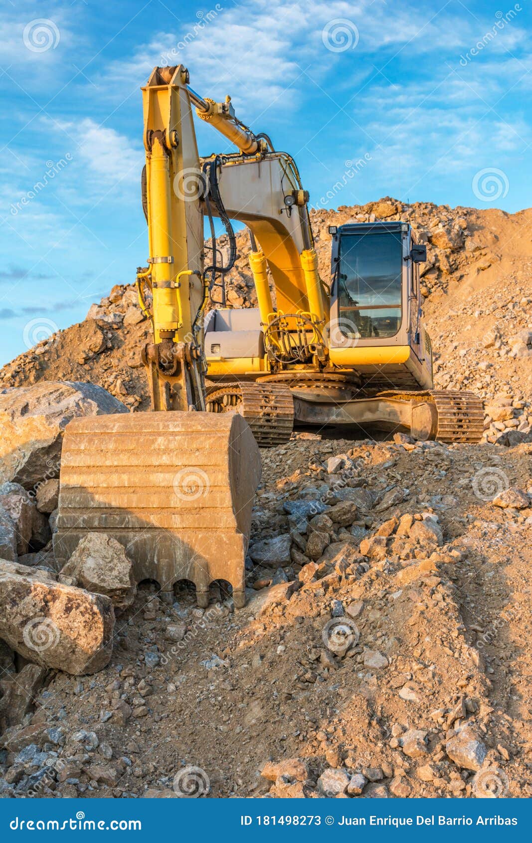 Construction Site with an Excavator Moving Rock Stock Image - Image of ...