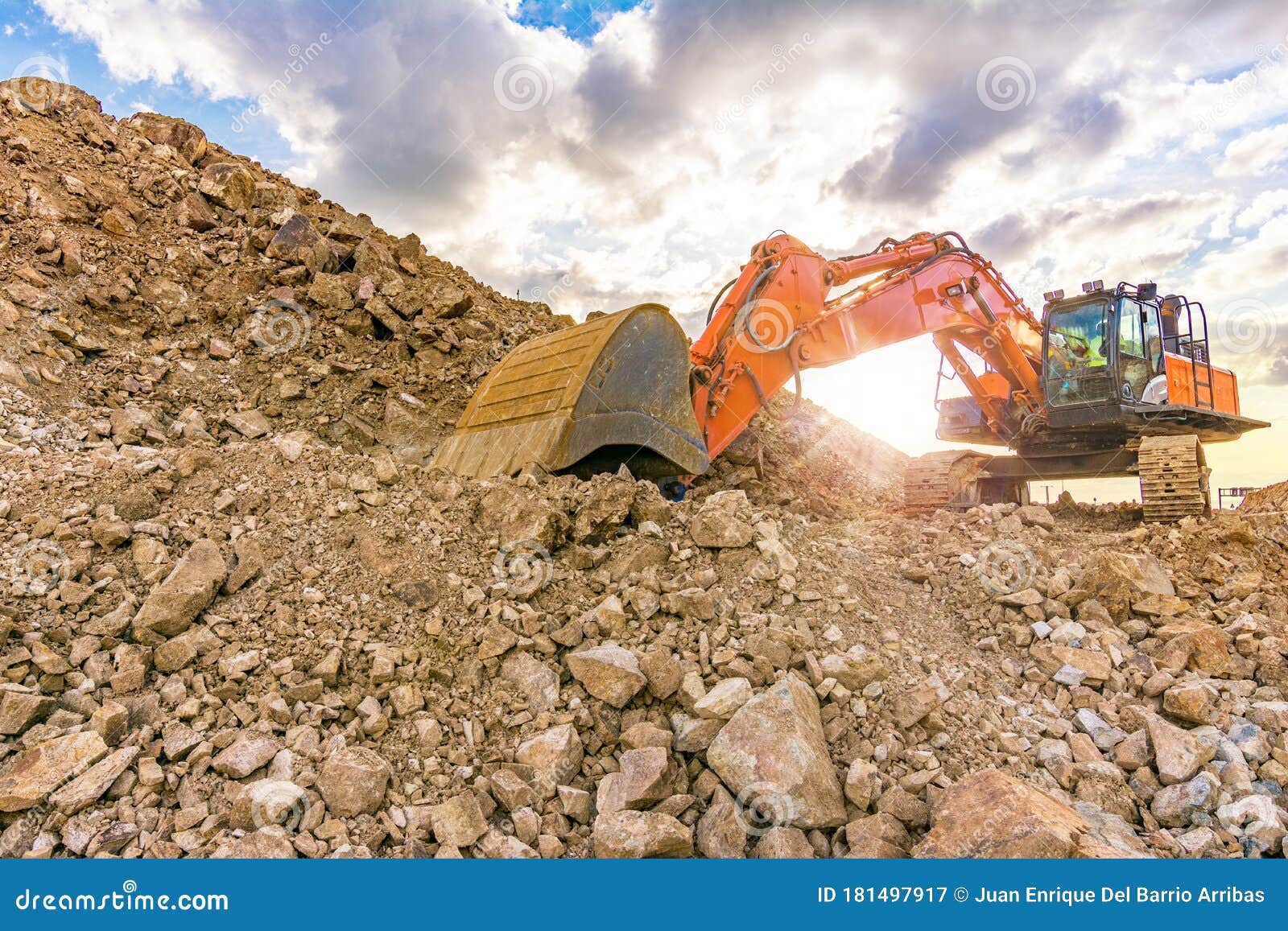 Construction Site with an Excavator Moving Rock Stock Image - Image of ...