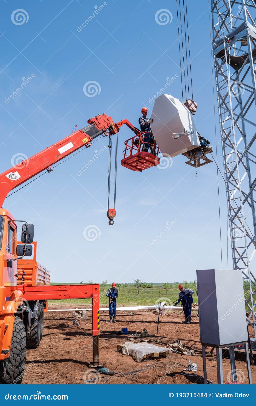 Construction Site. Installation of a Wind Generator Using a Crane and ...